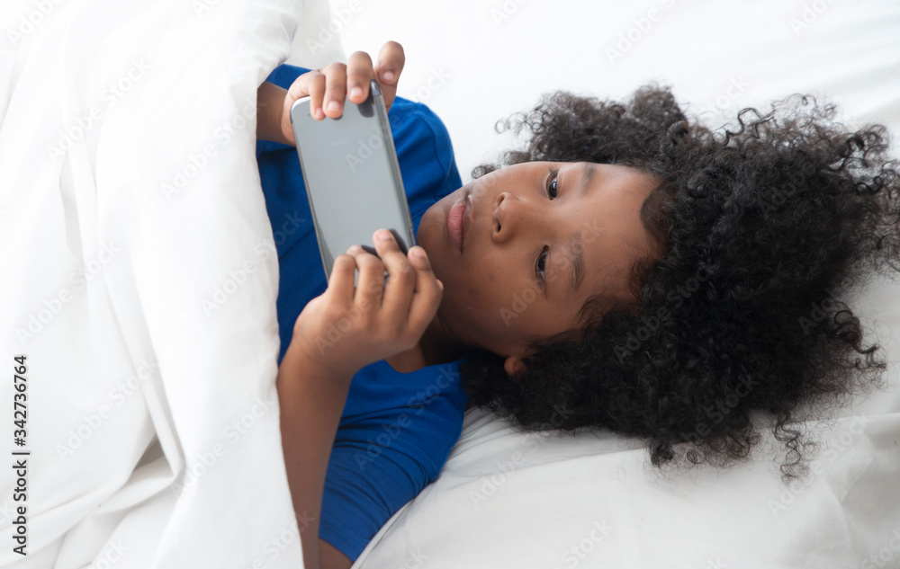 internet and network addiction. Little child is Nomophobia syndrome. It ...