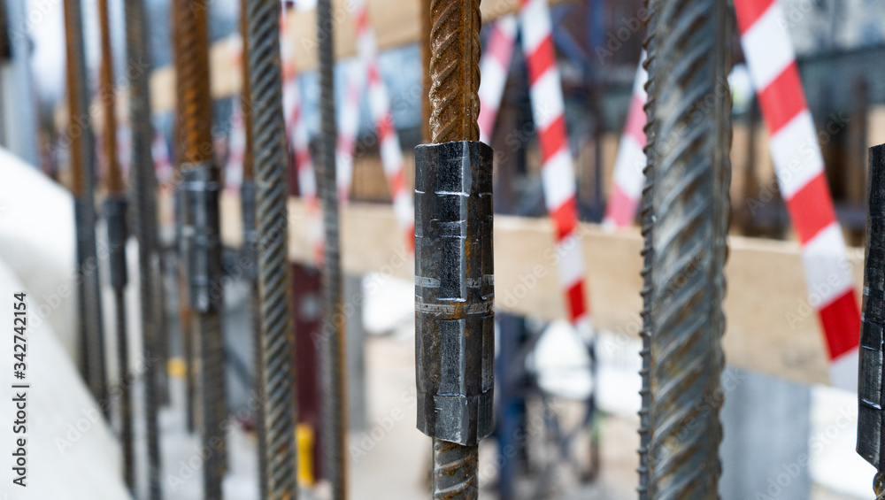 Construction, fittings, excavator, workers in suits, fastening fittings ...