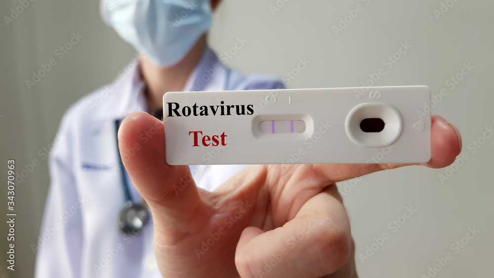 Pediatric doctor show positive rapid laboratory Rotavirus test for ...