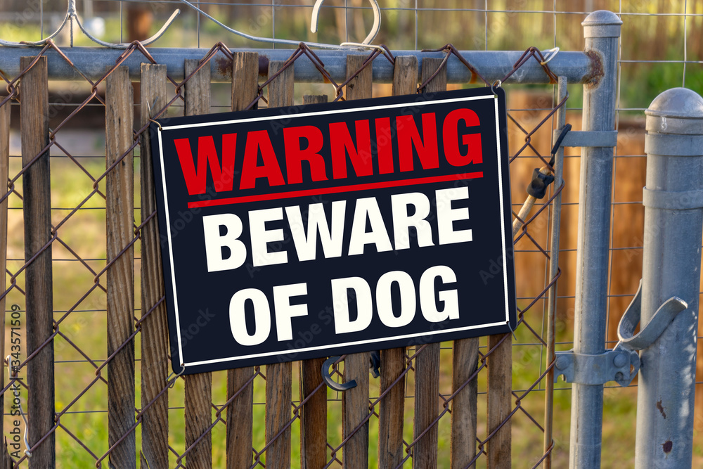 WARNING BEWARE OF DOG - sign on chain link fence. Stock Photo | Adobe Stock