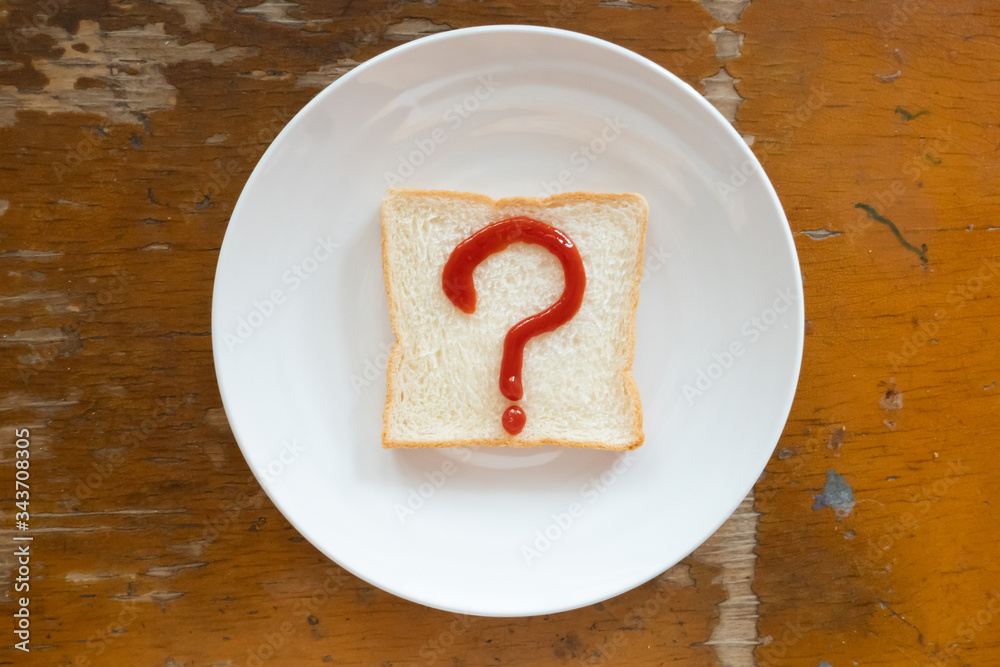 bread of breakfast is written Question mark sign by ketchup on write ...