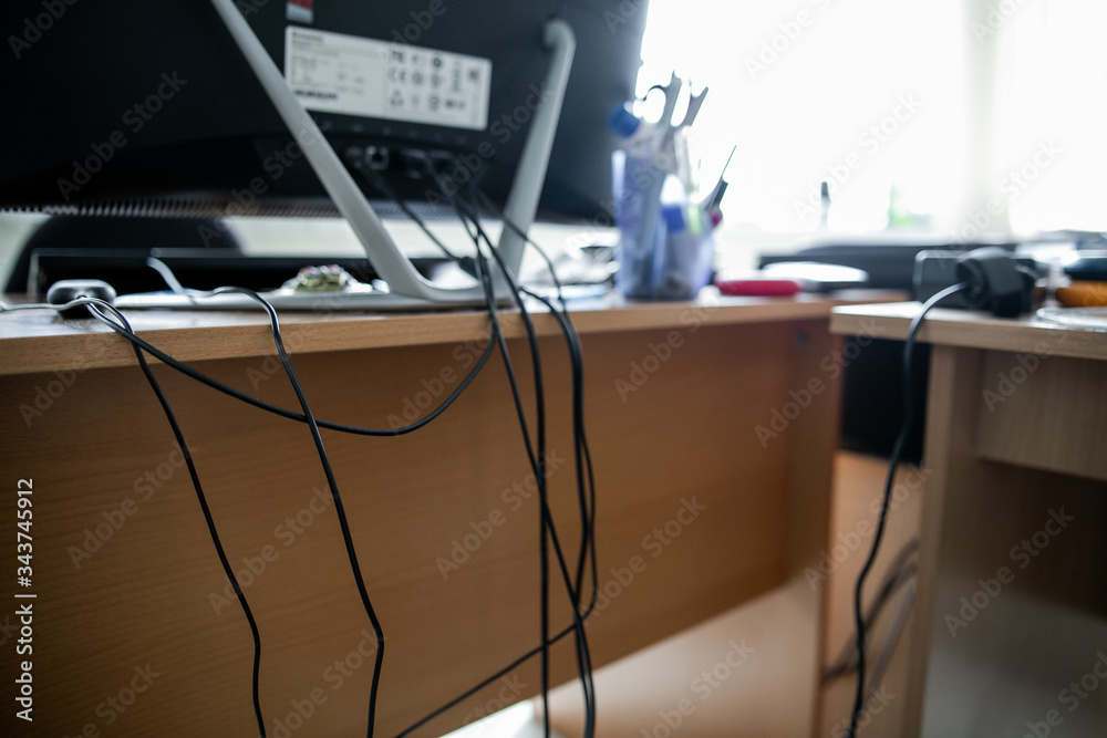 Concept of clutter in office. Unwound and tangled electrical wires ...