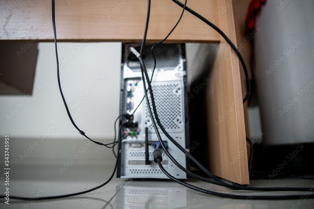 Concept of clutter in office. Unwound and tangled electrical wires ...