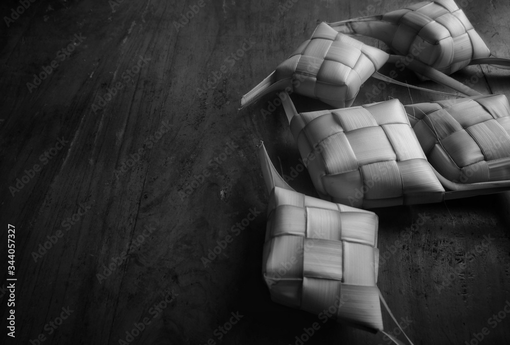 ketupat is a type of dumpling made from rice packed inside a diamond ...