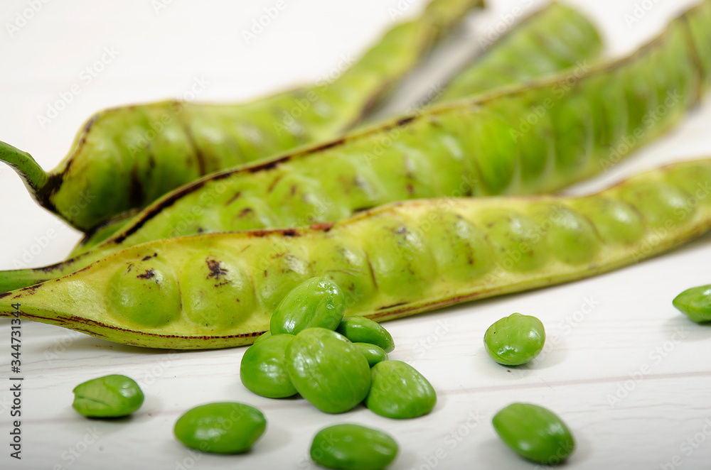 Petai, pete or stinky bean, is asian vegetable. take photo in white ...