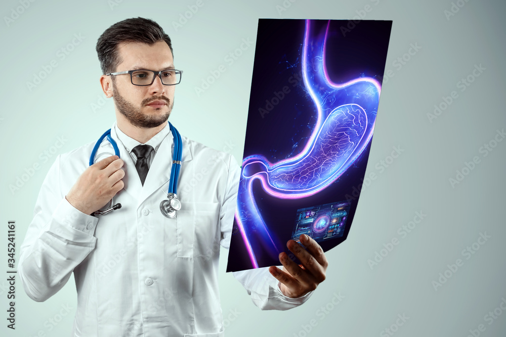 Doctor against the background of a hologram of the stomach, endoscopy ...
