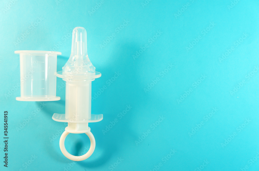 smart medical needle dispenser on a blue background with place for your ...