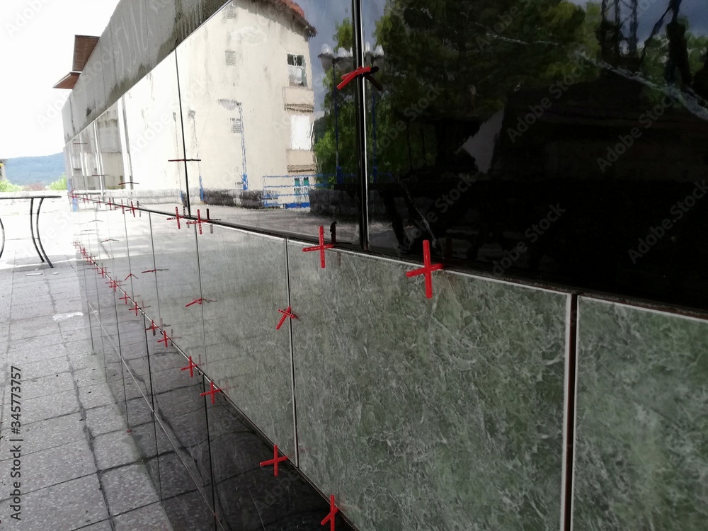 installation of ceramic tiles with plastic spacers used in tiling a ...