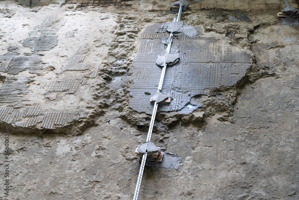 Floor preparation for concrete pouring. Installation of level guide for ...