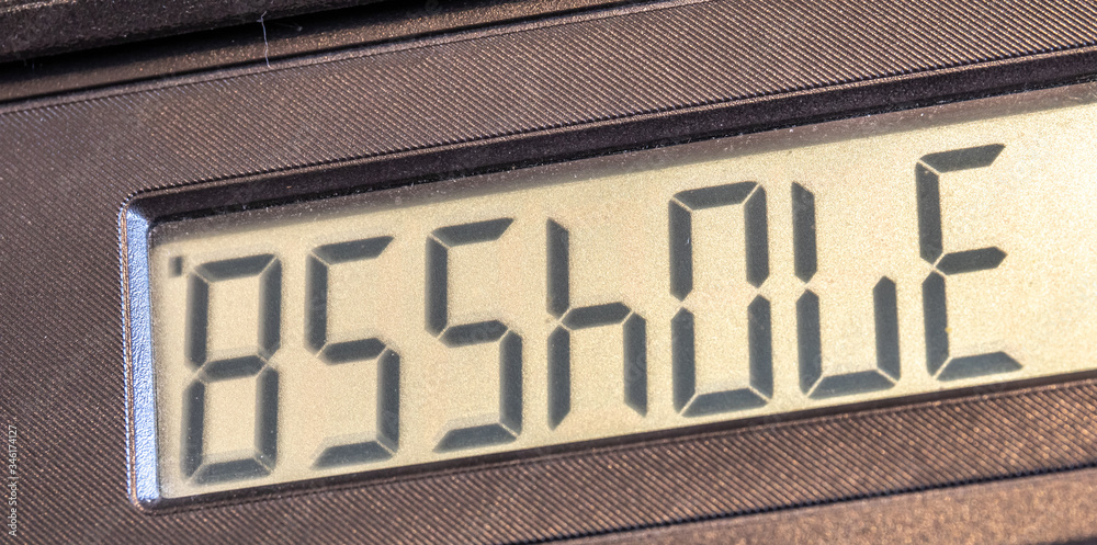 Old LCD calculator display upside down writing out a word asshole Stock ...