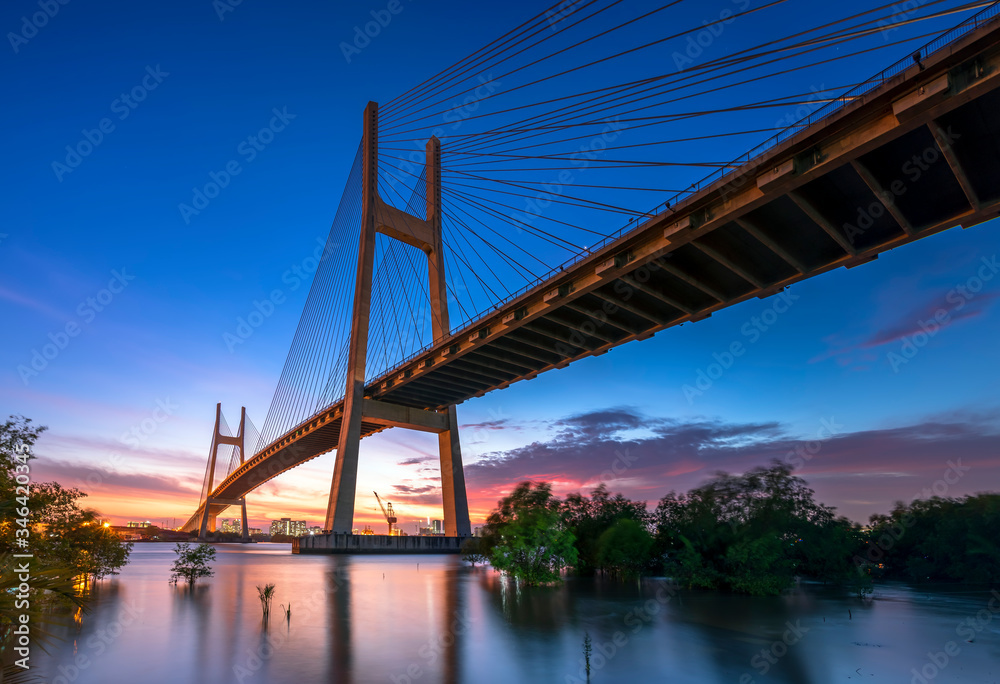 Beautiful sunset landscape at Phu My Bridge. This largest cable-stayed ...