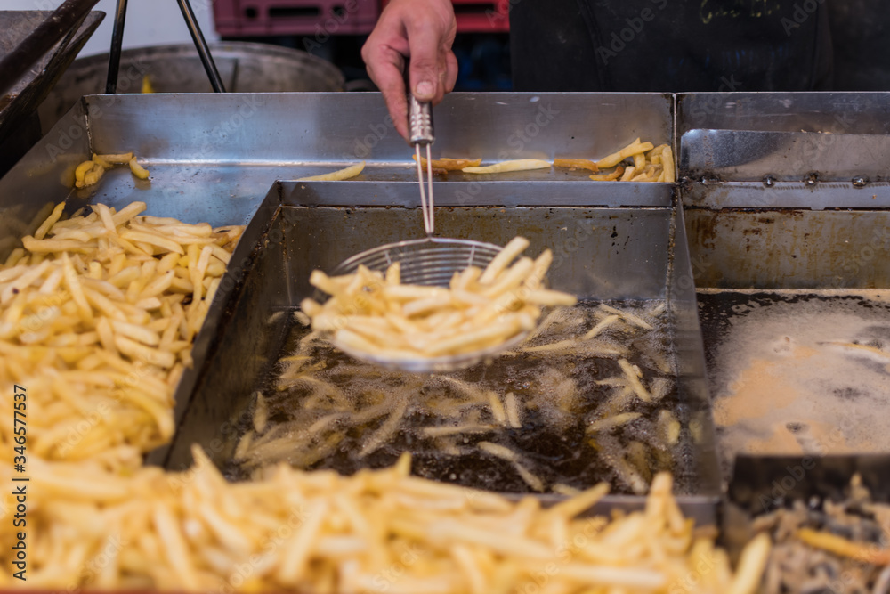 Deep fried fast food potatoes fries, during fast food festival, food ...