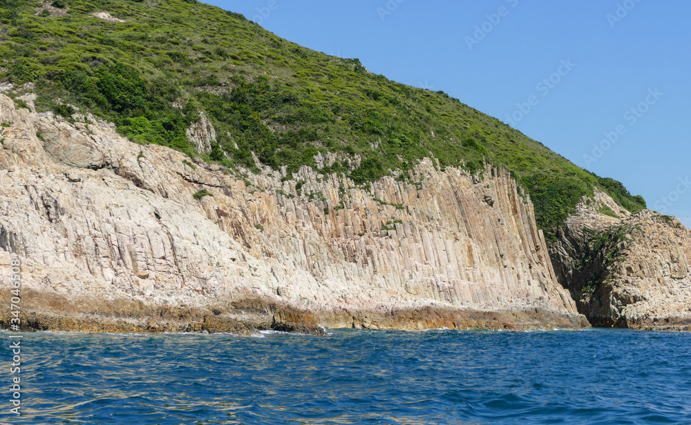 Huge hexagonal columnar joints of volcanic rock at Hong Kong Global ...