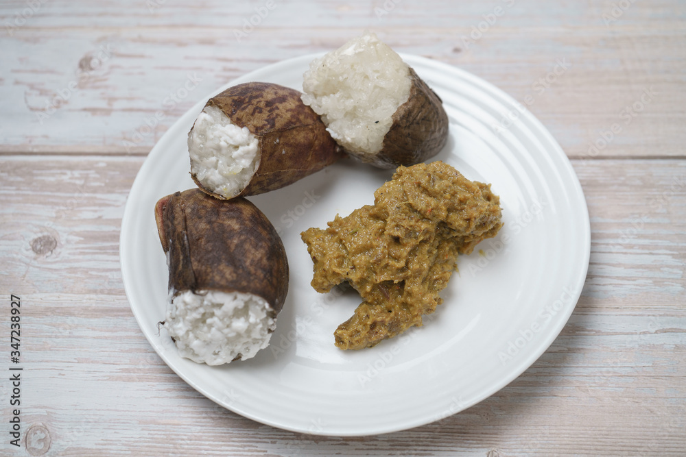 Glutinous rice steamed cooked with coconut milk in pitcher plants known ...