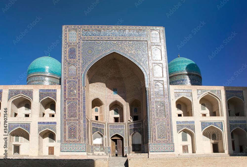 Sher-Dor Madrasah on Square Registan, the inscription above the gate in ...
