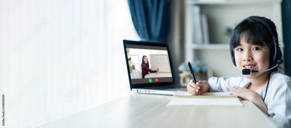 Homeschool Asian little young girl learning online class from school ...