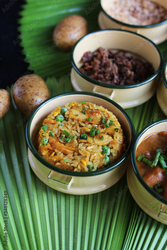 Tasty garlic fried rice served in classic yellow pinto (thai style ...