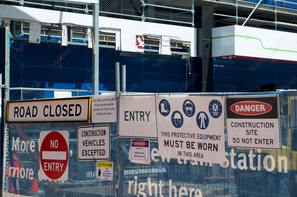 Various warning signs on construction site Stock Photo | Adobe Stock