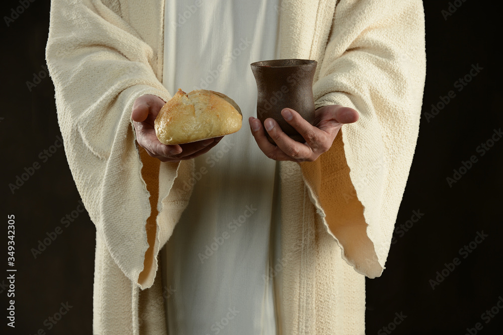 Jesus holding the bread and the wine Stock Photo | Adobe Stock