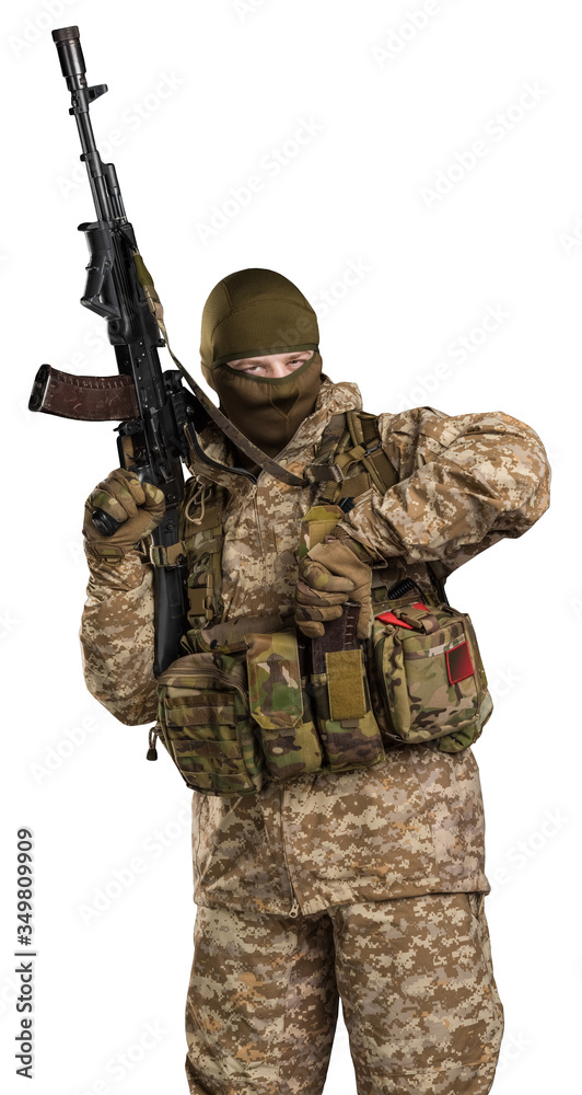 One soldier holding assault rifle. Uniform conforms to sub-unit of ...