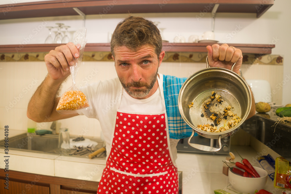Foto de Stock funny domestic portrait of messy and disaster home cook ...