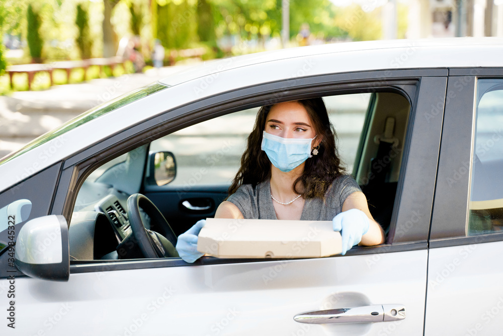 Safe food delivery from pizzeria to car during quarantine covid-19 ...