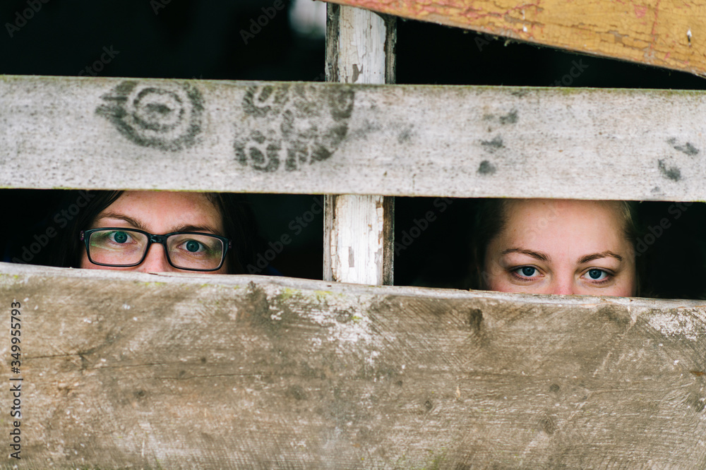 Two homeless illegal refuges girls in abroad shelter portrait. Social ...
