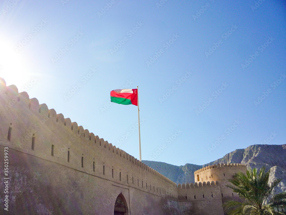Old walls of Khasab Fort in Al-Chasab in Oman with towers in ...
