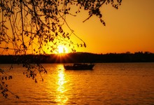 Yellow Sunset With Boats Free Stock Photo - Public Domain Pictures