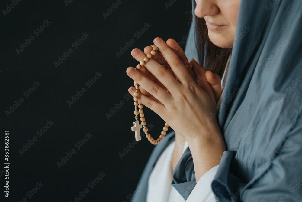 Praying with rosary Stock Photo | Adobe Stock