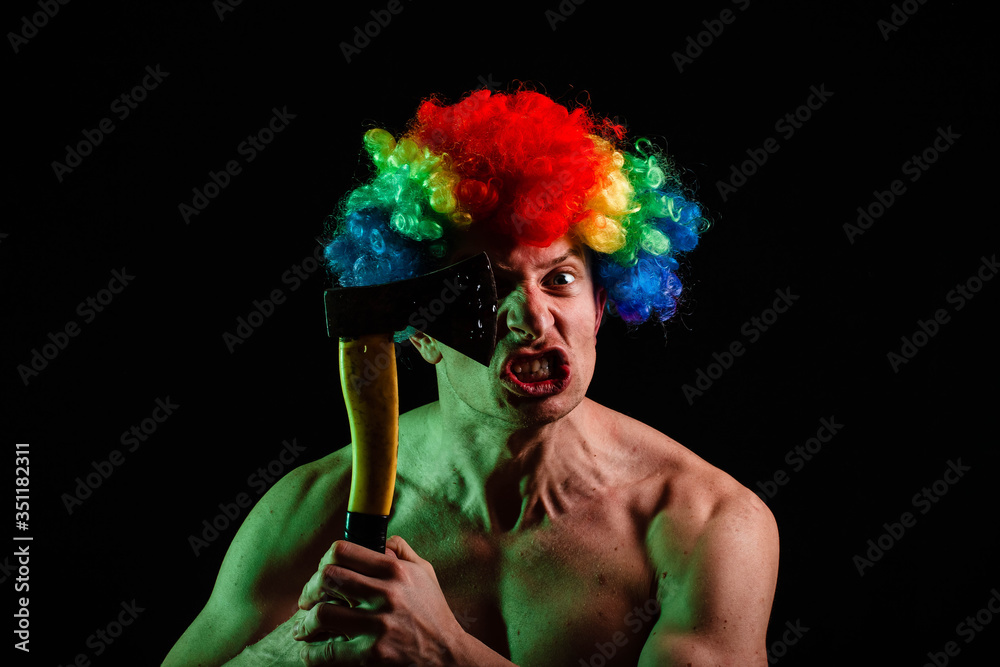 Crazy clown with an ax. Clown with an ax. Crazy. Psycho. Crazy man with ...