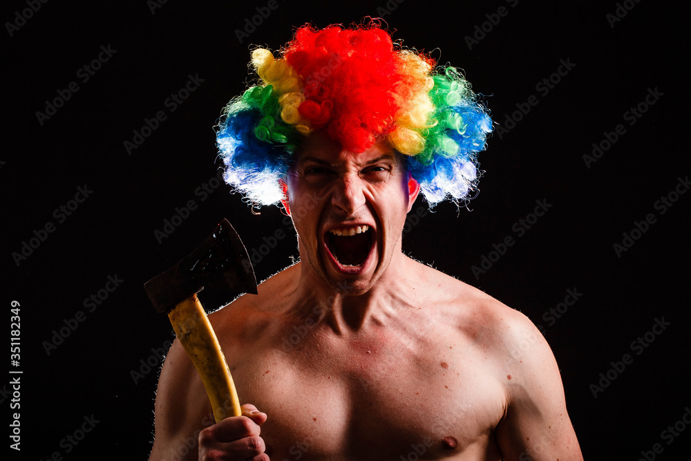 Crazy clown with an ax. Clown with an ax. Crazy. Psycho. Crazy man with ...