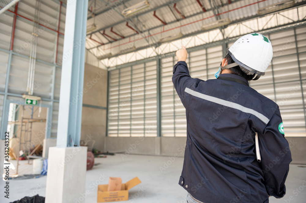 Civil engineer checking work construction site h. Building inspector ...