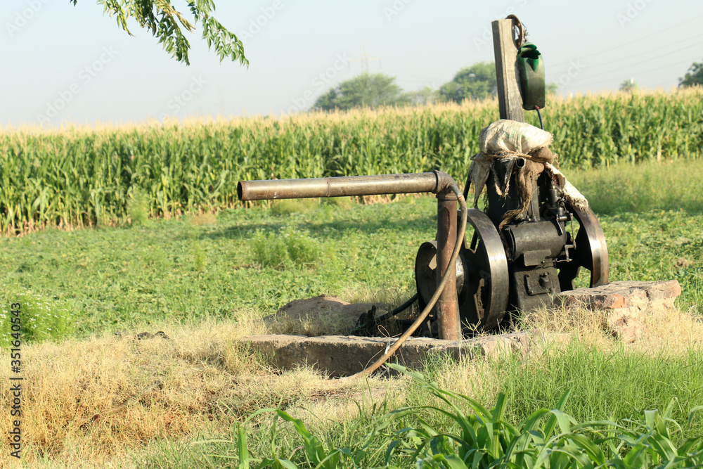 A diesel engine generated tube well installed in a field. Farming with ...