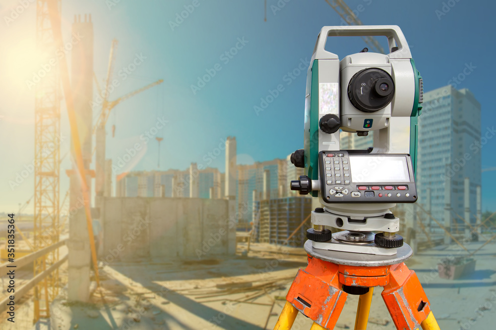Foto de Stock Total station. Geodetic tool at construction site ...
