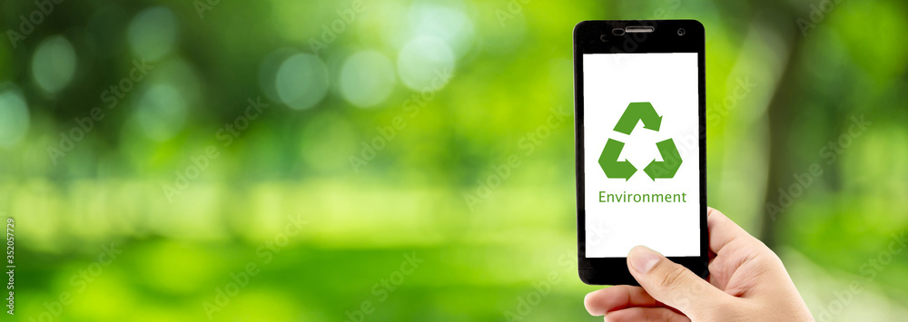 Smart phone holding hand with recycle symbol eco environment Icon ...