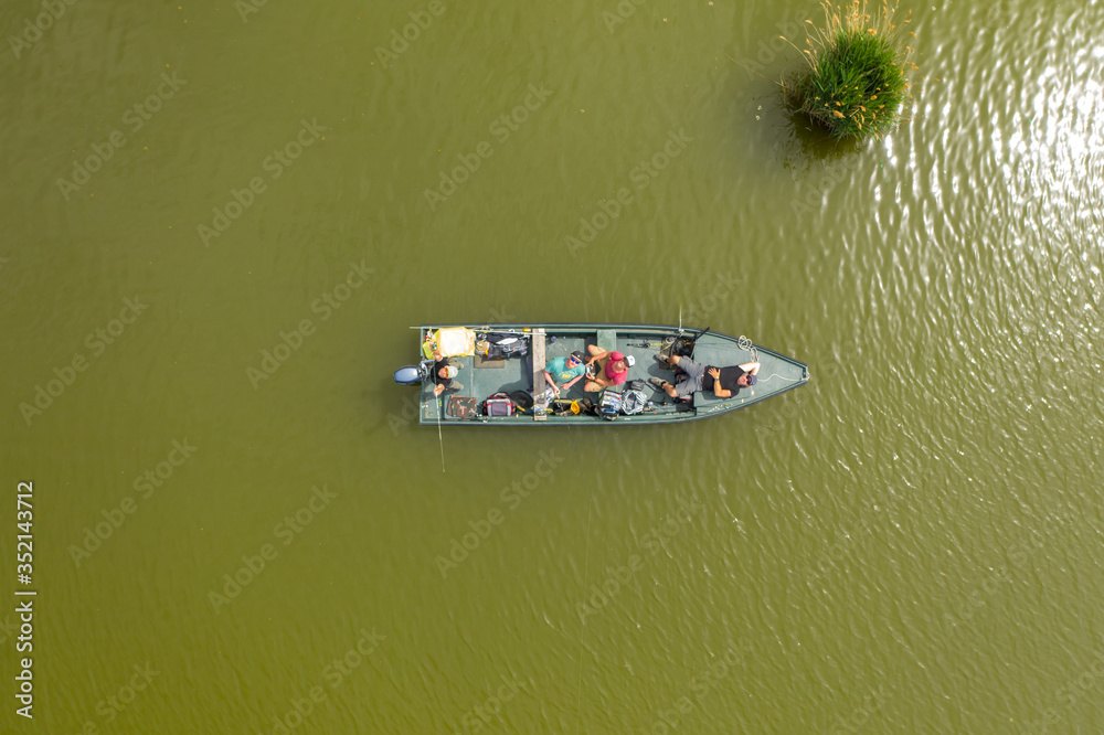 Fisherman vlogger at work filming new content. Stock Photo | Adobe Stock