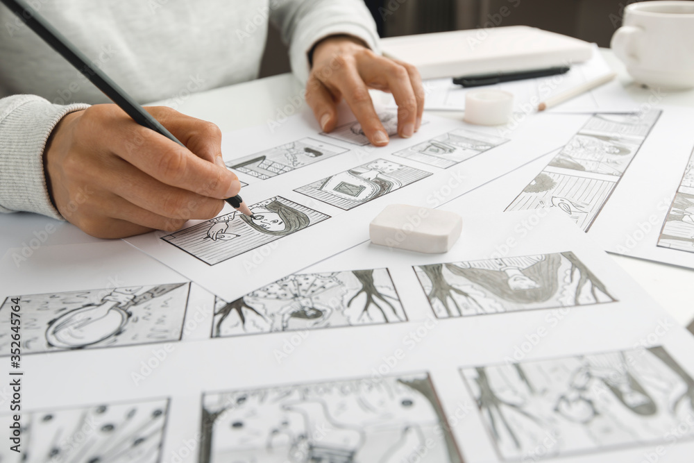 Artist illustrator draws a storyboard for the film. The animator ...