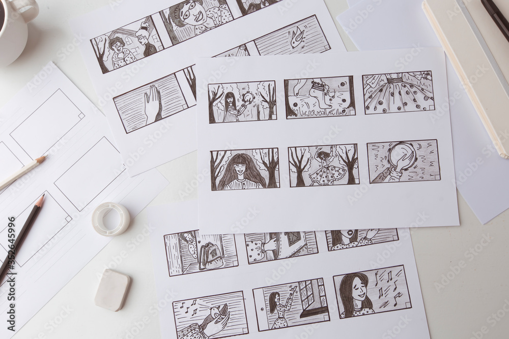 Workplace artist animator drawing a storyboard for a cartoon. Pre ...