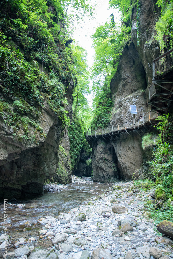 landscape of the kakoueta gorges, gorge with river and waterfall ...