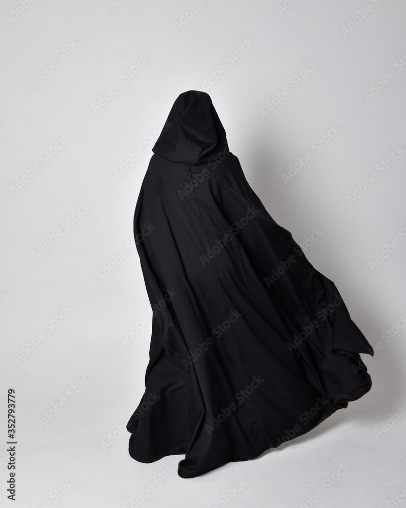 fantasy portrait of a woman wearing long black cloak. Full length ...
