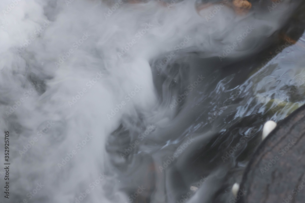 Defocused and blurred image for background. White steam,Hot Springs ...