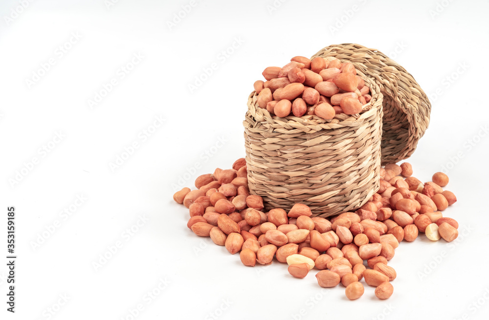 Isolated peanuts without shell in small wicker basket on white ...