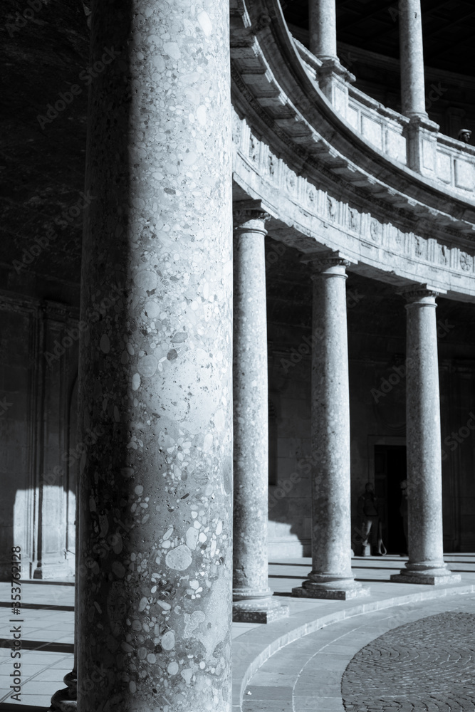 old abandoned stone roman building with pillars. vintage black and ...