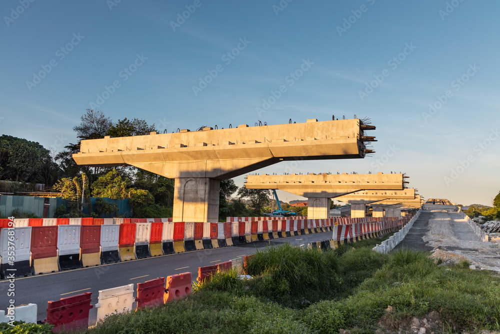 Construction of highway overpass bridge infrastructure in progress with ...