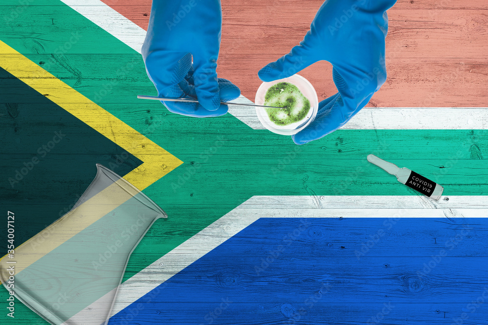 South Africa flag on laboratory table. Medical healthcare technologist ...