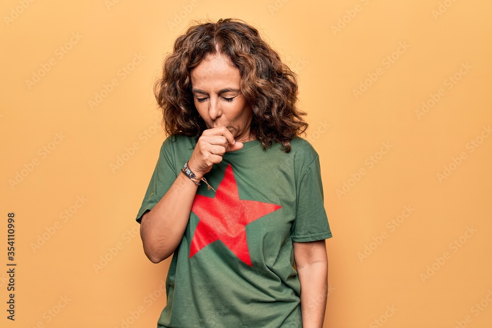 Middle age beautiful woman wearing t-shirt with red star revolutionary ...