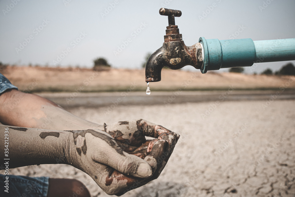 The little boy waiting for drinking water to live through this drought ...