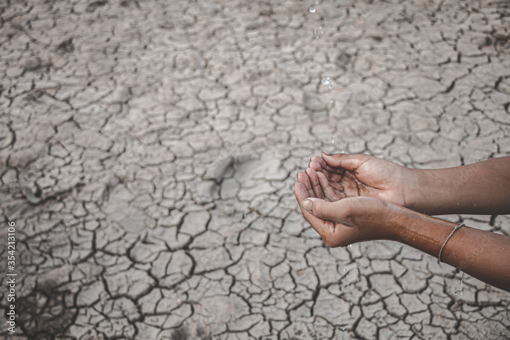 The little boy waiting for drinking water to live through this drought ...