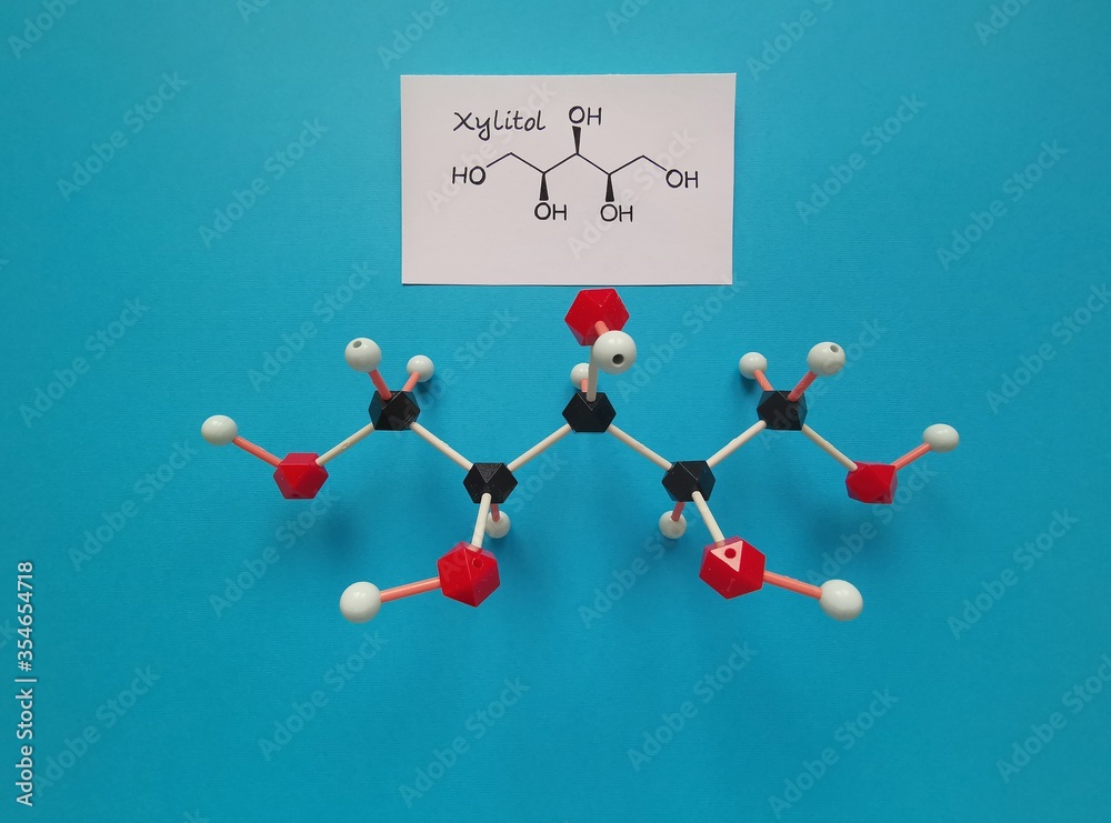 Molecular structure model and structural chemical formula of xylitol ...